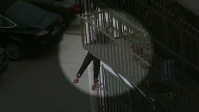 Toddler's head stuck in bars, dangles from 6th-floor balcony | Fox News ...